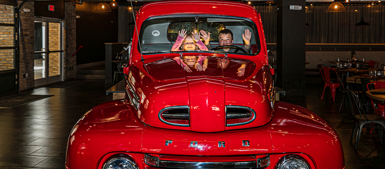 The Story Behind The Ford at the American Kitchen Bar & Grill